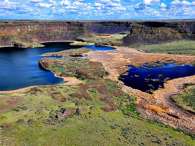 Dramatic cliffs frame blue waters in this geological wonder that rewrote the landscape in mere days.