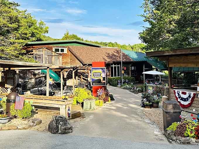 Patriotic bunting and flowering plants frame the rustic entrance to a geological marvel that's been millions of years in the making.