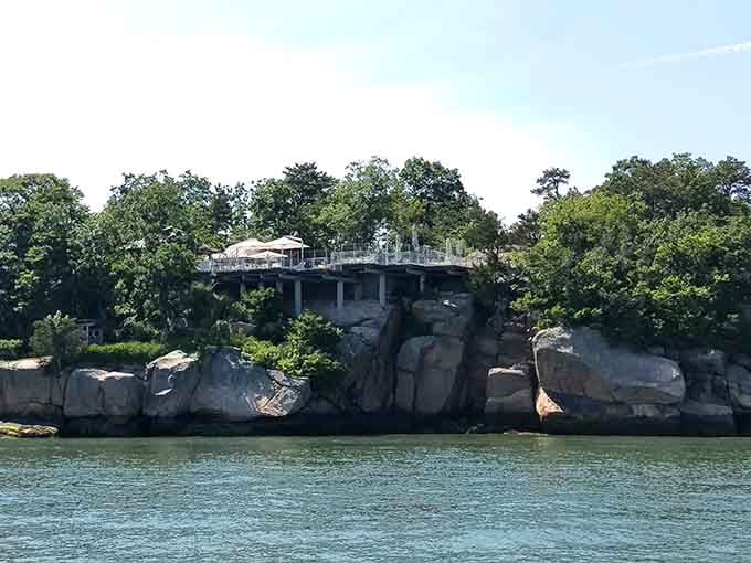 Rocky outcrops crowned with charming homes create a postcard scene worthy of any New England calendar.
