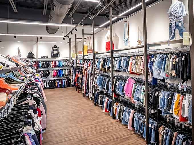 Rows of curated clothing stretch endlessly, organized like a boutique where style meets savings in perfect harmony.