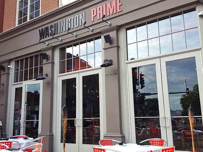 Floor-to-ceiling windows reveal the sophisticated interior where power lunches and anniversary dinners happen side by side.