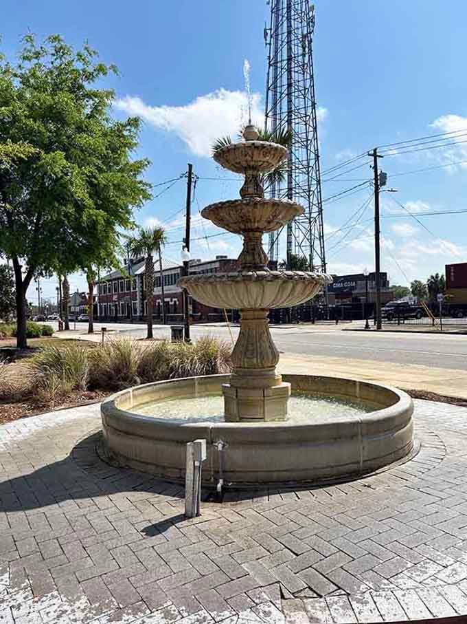 That fountain catching the sunlight is the kind of town centerpiece where neighbors actually stop to chat and catch up.