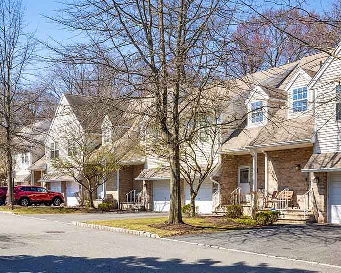Townhomes with front porches invite the kind of neighbor chats that used to define American suburban life.