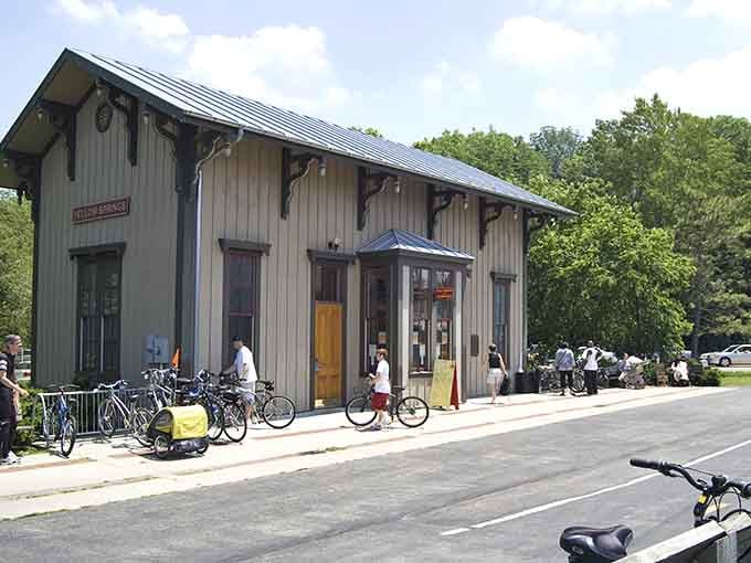The old train depot stands ready for visitors, bicycles lined up like eager students waiting for recess to begin.