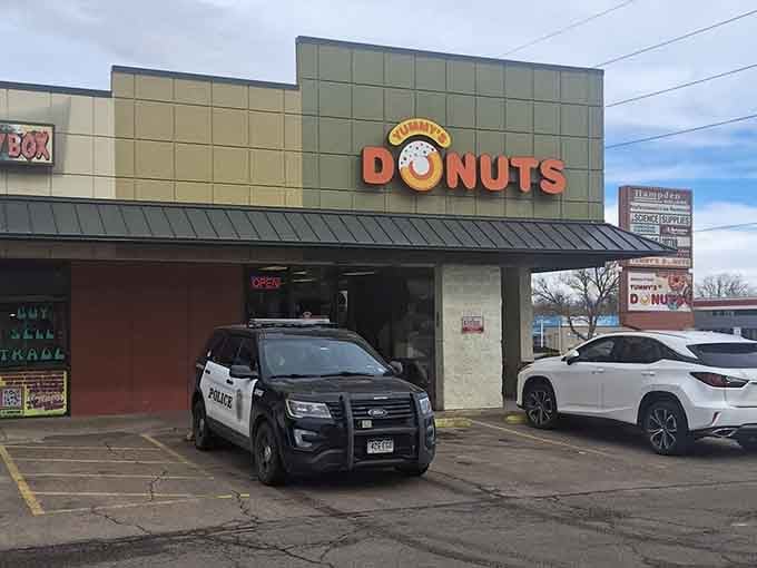 That simple storefront hides a treasure trove of fried dough perfection that keeps the neighborhood coming back daily.