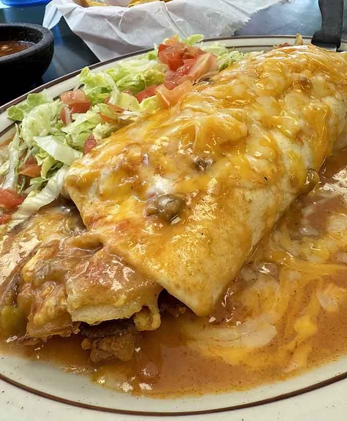 This golden masterpiece proves that sometimes the best things in life come wrapped in melted cheese.