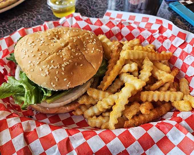 That sesame seed bun and those crinkle-cut fries are giving serious "Happy Days" vibes, and we're here for it.