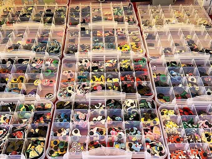 Tiny treasures organized in clear compartments, like the world's most adorable hardware store for crafters and collectors.