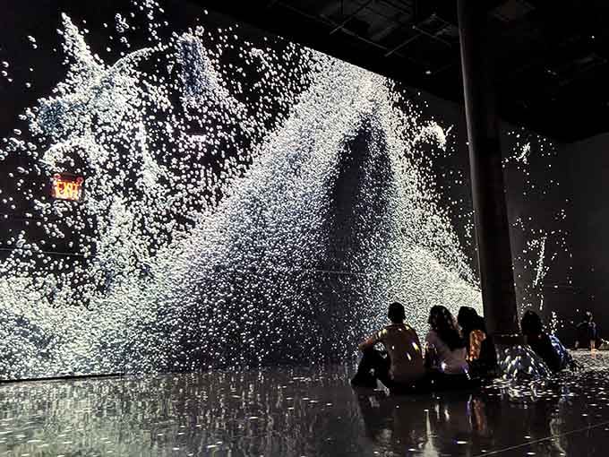 Monochromatic waves crash across every surface, proving that sometimes the best art doesn't need a single color.