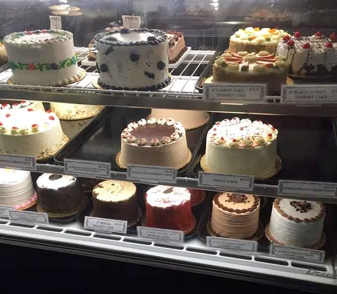 The cake case displays more temptation than you can handle, each one ready for its close-up moment.