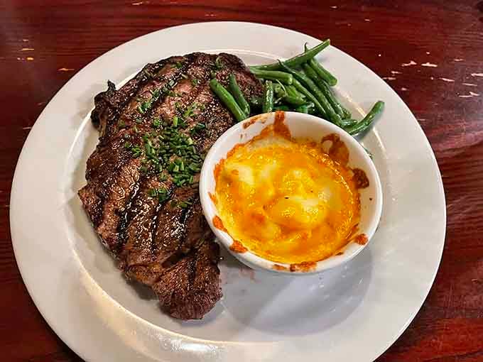 That perfectly charred ribeye with mac and cheese proves they take their steak credentials seriously around here.