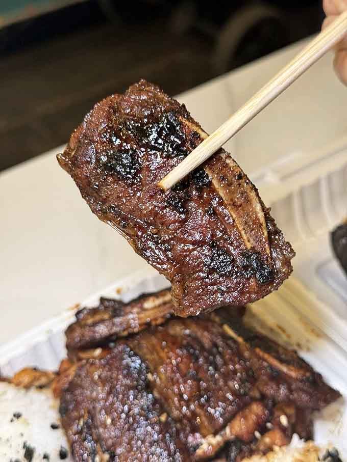 These teriyaki spare ribs have that caramelized glaze that makes chopsticks completely optional, honestly.