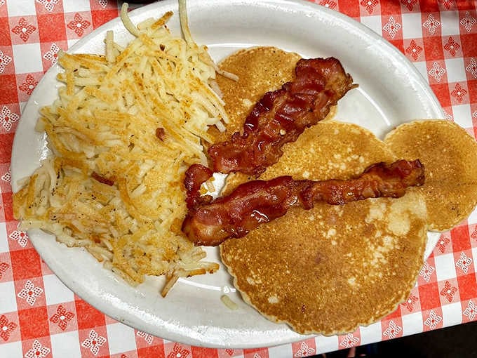 Golden pancakes and bacon strips that could make a vegetarian reconsider their life choices.