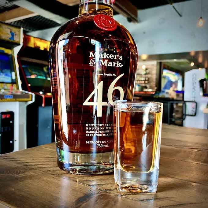 Maker's Mark 46 standing tall like the MVP it is, ready to fuel your quest for high scores.