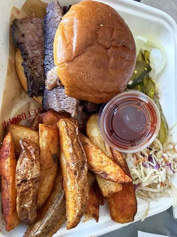 A brisket sandwich with fries and slaw: sometimes the classics become classics for very good reasons indeed.