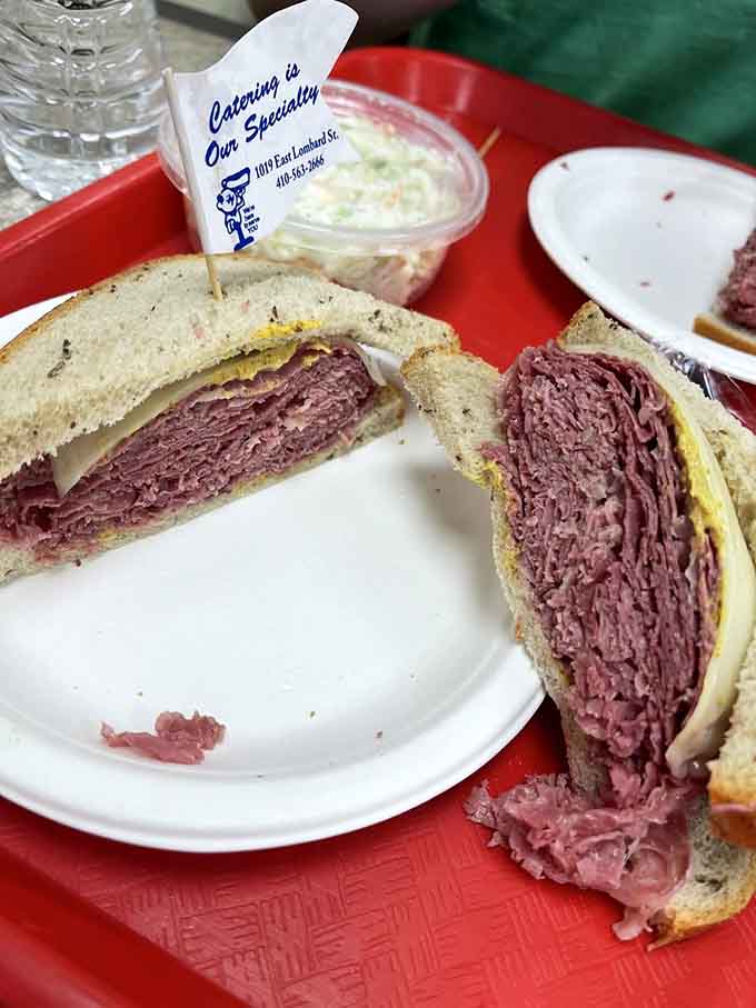 Behold the corned beef masterpiece, sliced thick and stacked higher than your ability to fit it in your mouth.