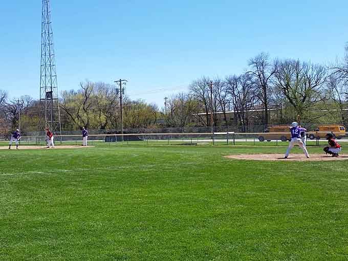 Spring baseball under open skies where the crack of the bat still echoes louder than any smartphone notification.