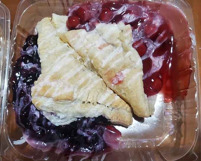 Homemade pies with fruit filling that would make any church potluck jealous sit ready for dessert lovers.