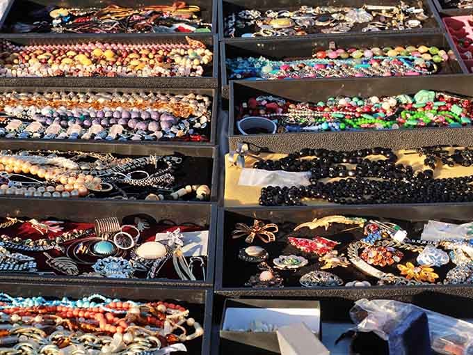 Jewelry displays that would make Elizabeth Taylor jealous, organized by color for maximum browsing efficiency and temptation.