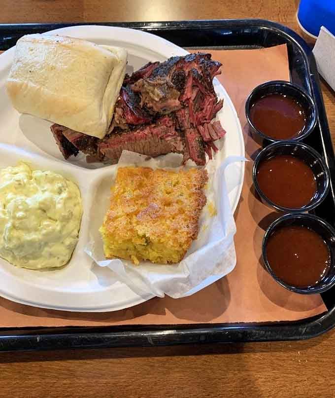 When brisket looks this good on the plate, you know someone's been tending that smoker with serious dedication.