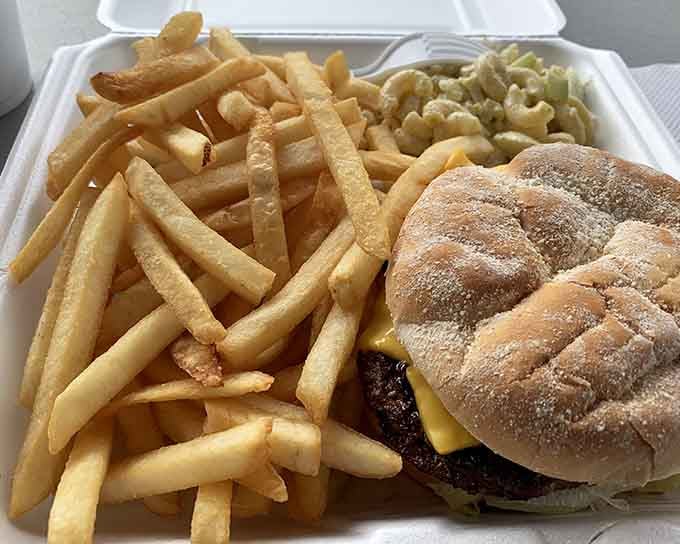 Golden fries piled high alongside a perfectly grilled burger on a Kaiser roll, this is what lunchtime dreams are made of.