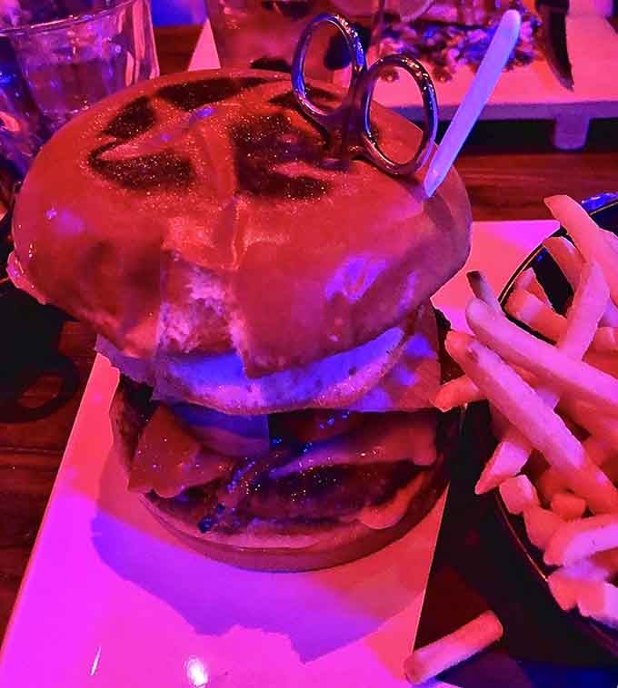 Edward Burger Hands stacks impossibly high, challenging both your jaw capacity and your commitment to dignity.