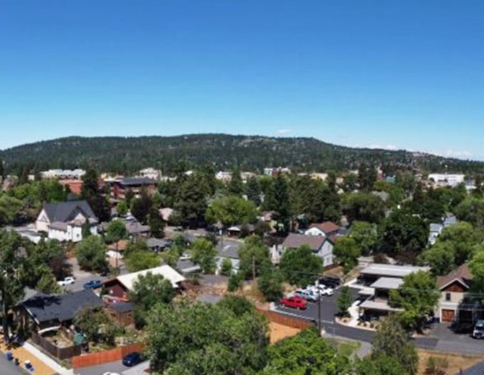 Where neighborhoods meet mountains and every backyard comes with a panoramic view—small-town living never looked so picture-perfect.