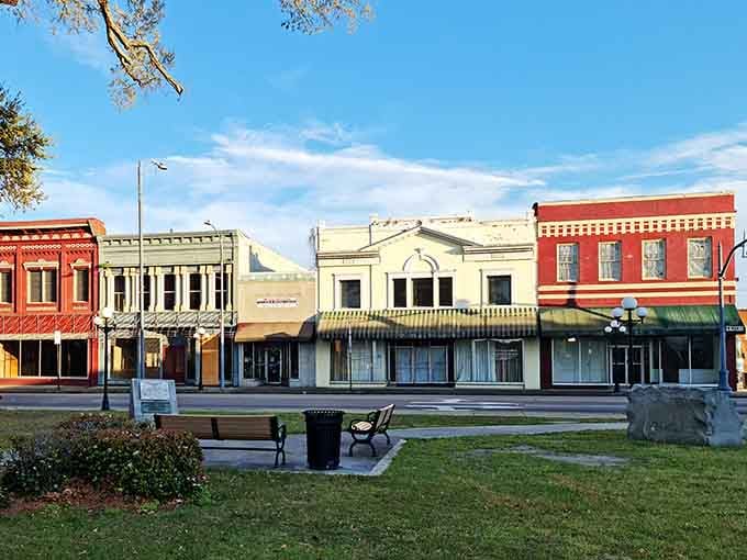 These colorful storefronts look like they're competing in a friendly "who wore it better" contest.