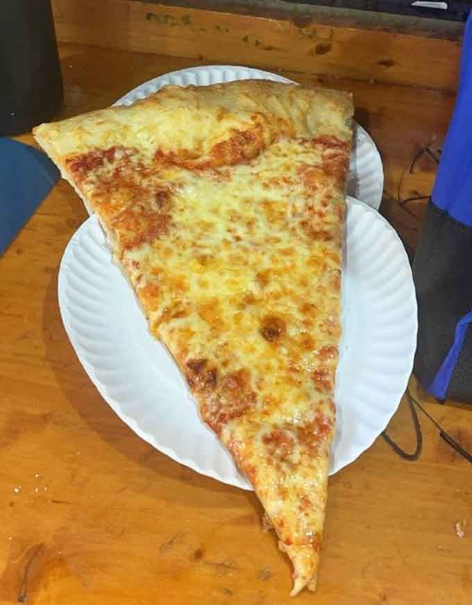 This cheese slice is so long it needs its own area code and possibly a building permit.