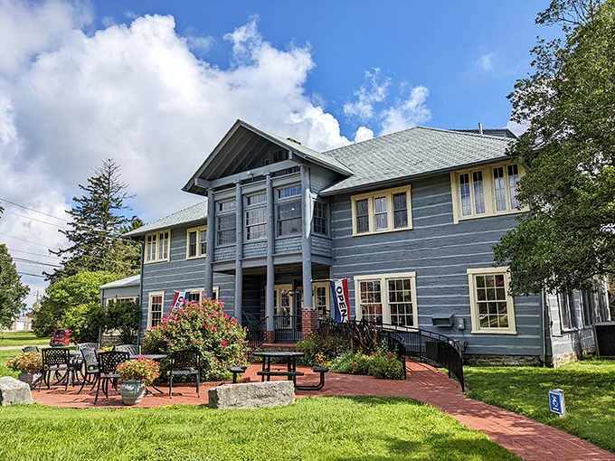 The Log House Craft Gallery sits pretty, filled with student-made treasures that put your college pottery to shame.