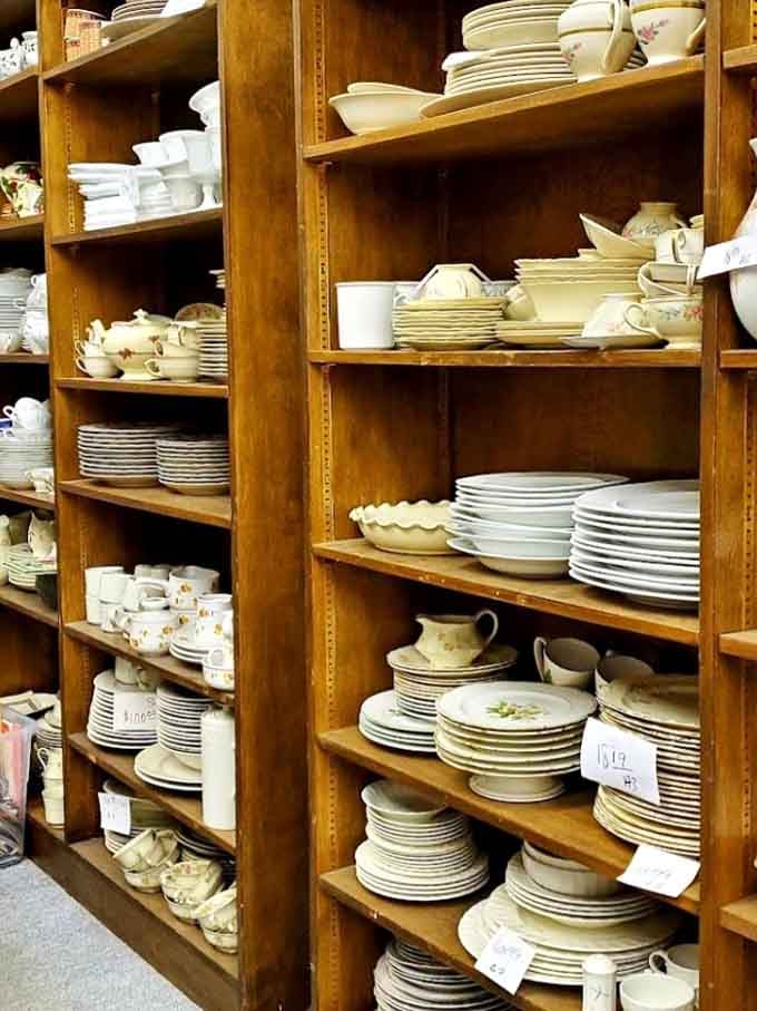 Dinnerware stacked like a pottery barn exploded in the best possible way, ready for your next dinner party.