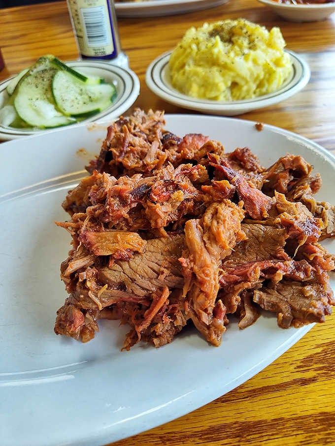 Pulled beef so tender it practically falls apart if you look at it wrong, in the best way possible.