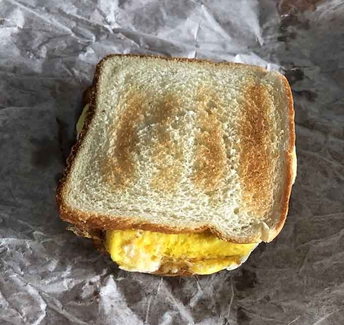 Breakfast between bread never looked so honest, so perfectly golden, so necessary.