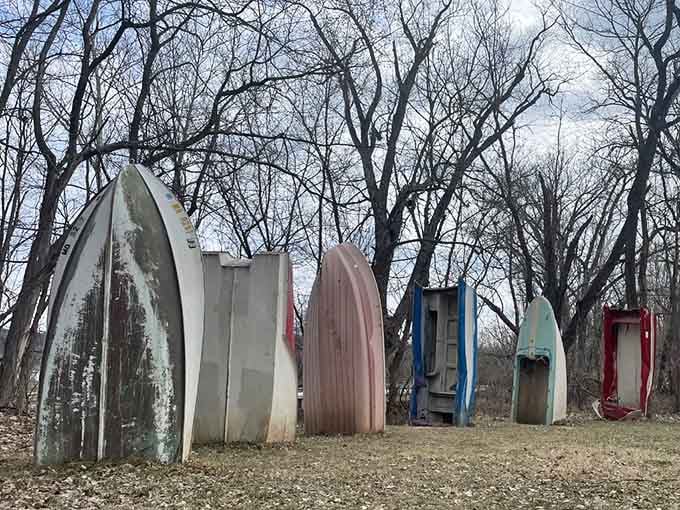 Winter reveals the boats in their full glory, stripped of pretense and standing proud against bare trees.