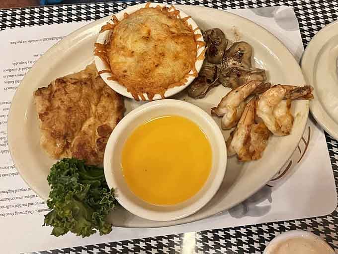 This broiled seafood platter delivers more treasures than a pirate's chest, minus the scurvy and questionable hygiene.