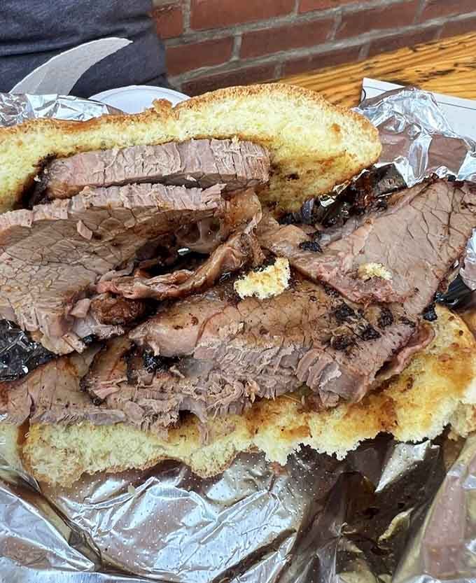 Brisket piled this high should probably require a permit, but we're not complaining one bit.
