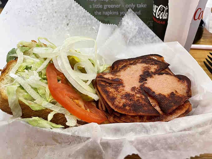 Fried bologna never looked so good&mdash;this sandwich could make even your pickiest uncle reconsider his lunch order completely.