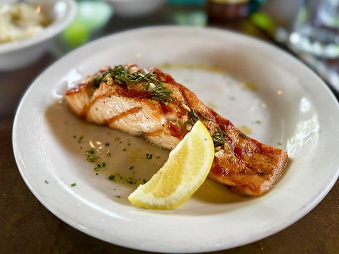 Grilled salmon with a perfect char that proves this kitchen knows its way around more than just comfort classics.