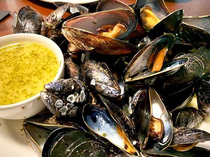 Mussels steamed to perfection with garlic butter&mdash;proof that simple preparations often yield the most spectacular results.