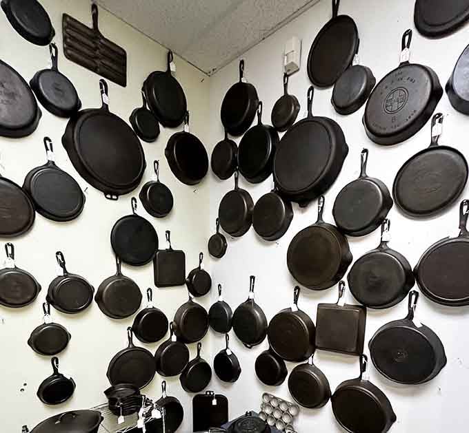 This cast iron wall installation is either brilliant merchandising or someone's fever dream, either way it's magnificent.