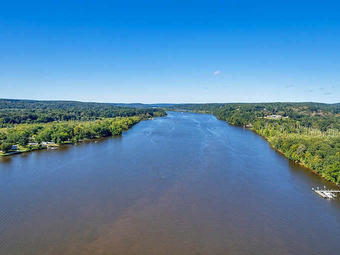 The Connecticut River stretching out like a liquid highway through centuries of American history and natural beauty.