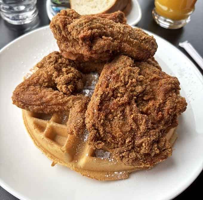 Chicken and waffles so perfectly golden, they practically glow with the promise of a food coma worth having.