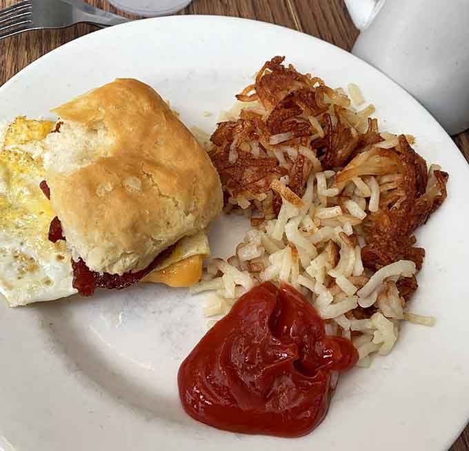 Golden hashbrowns so crispy they crackle, paired with a biscuit sandwich that could make a grown person weep with joy.