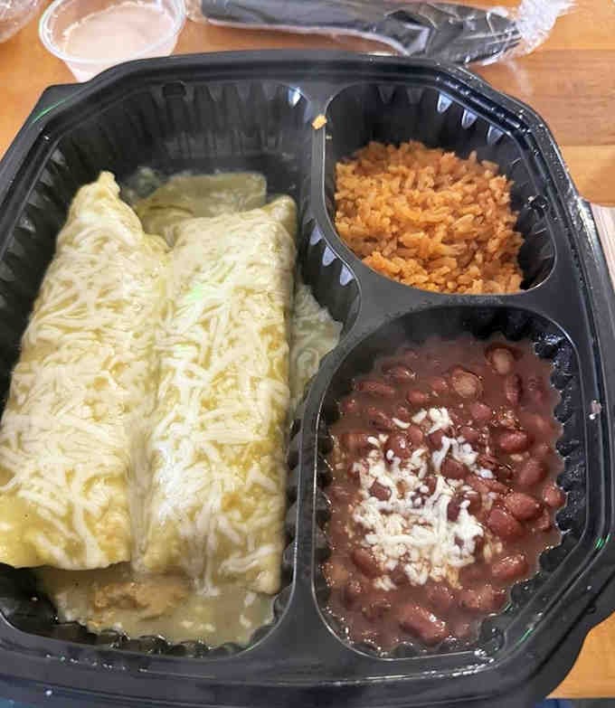 Even takeout looks this good—enchiladas that travel well and taste like they just left the kitchen.
