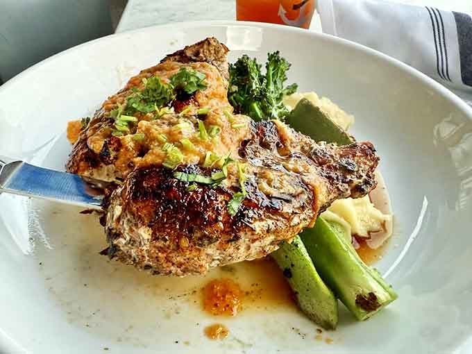 Chili roasted chicken that's been treated with the respect it deserves, plated like edible art with vegetables that actually matter.