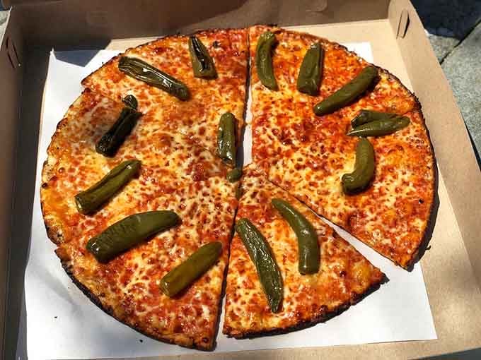 When stingers meet hot oil on ultra-thin crust, your taste buds are in for a spicy awakening.