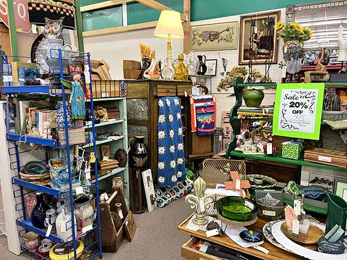 Every shelf tells a different story, from vintage owls to green pottery that screams 1970s chic.