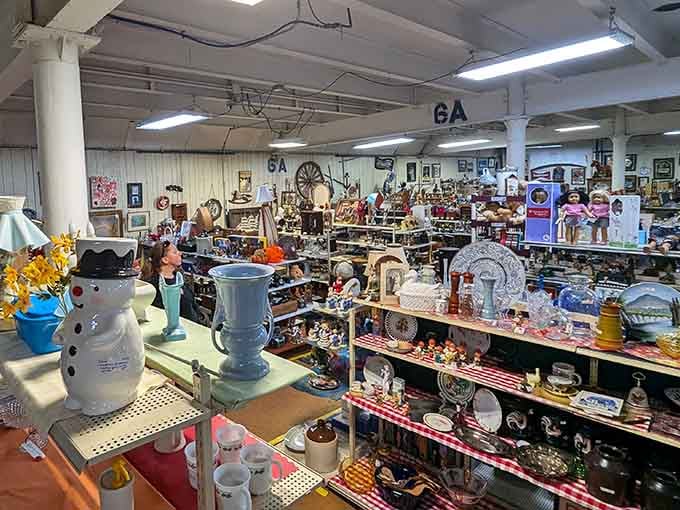 Kitchen collectibles and vintage housewares line the shelves like a museum of domestic life gone by.