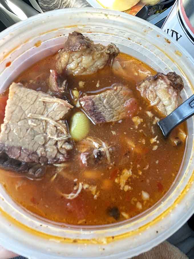 Brunswick stew so hearty it could be a meal on its own, packed with tender meat swimming in rich, savory goodness.
