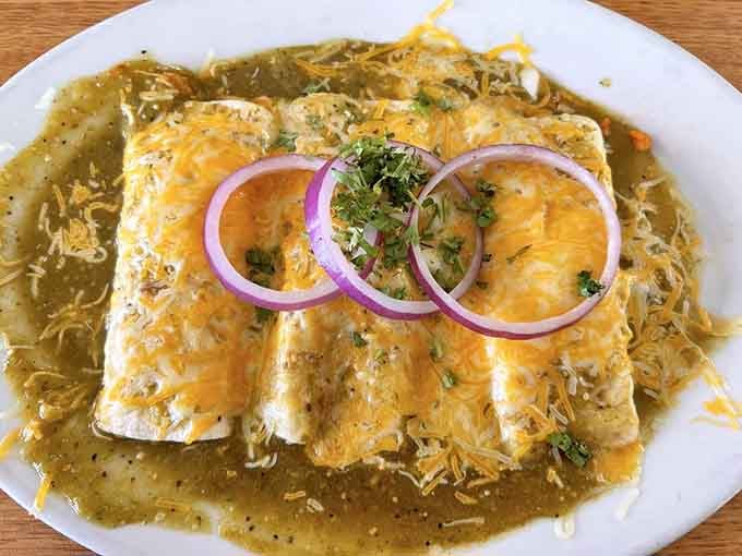 Those enchiladas swim in sauce and melted cheese like they're auditioning for a comfort food hall of fame.